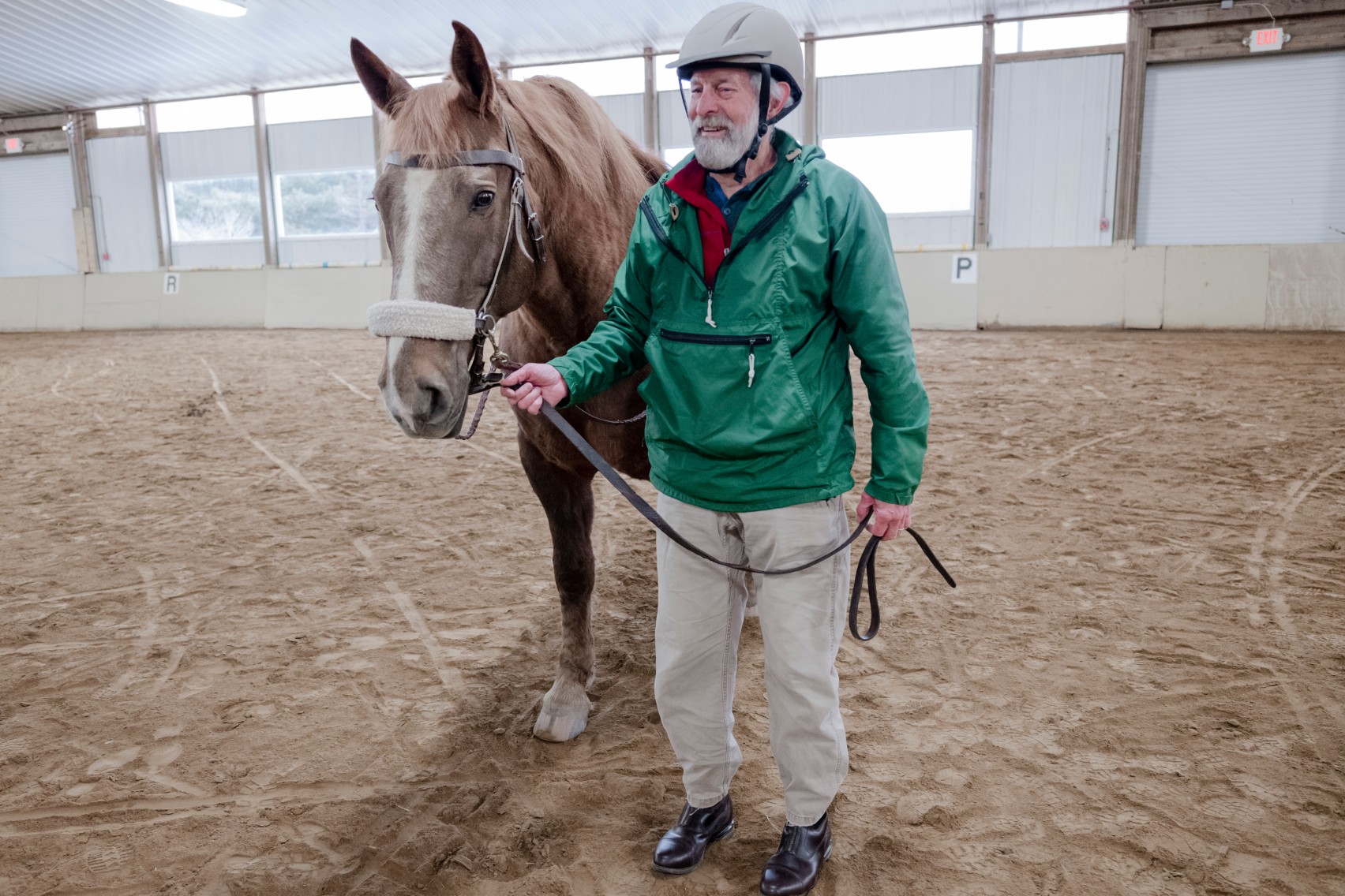 Tim connects with horses - Fieldstone Farm Therapeutic Riding Center